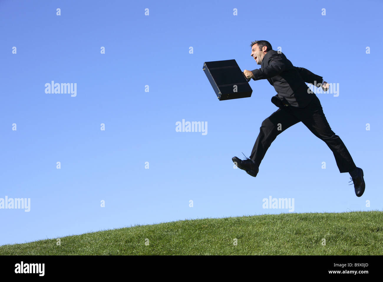 Business man happy jump outside hi-res stock photography and images - Alamy