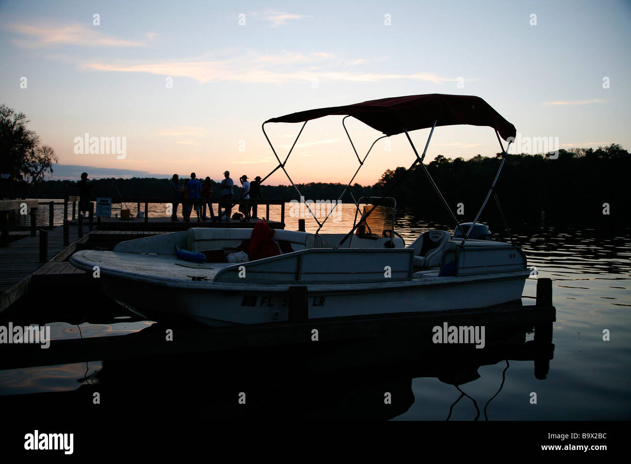 Sunset on lake boat hi-res stock photography and images - Alamy