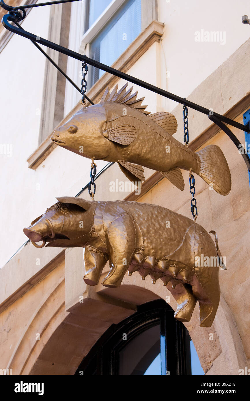 Traditional shop sign, butcher and fishmonger Stock Photo - Alamy