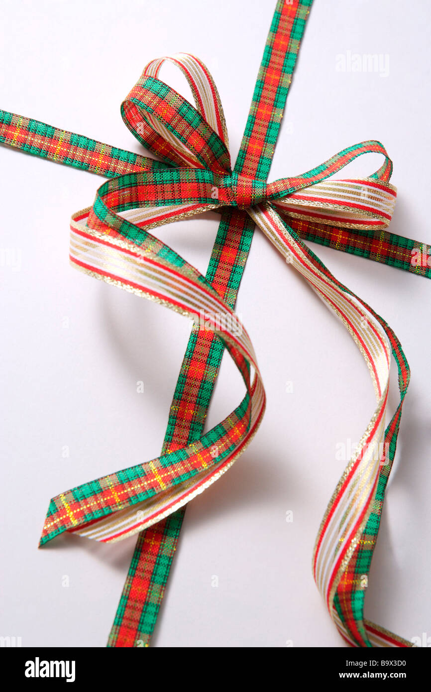 Wrapped gift with ribbon Stock Photo - Alamy