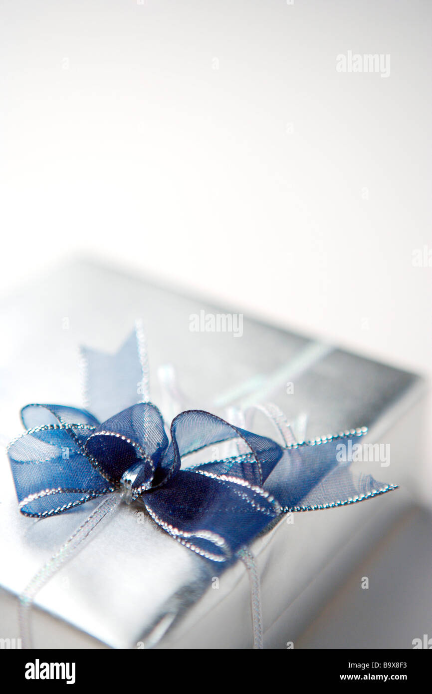 Wrapped present with ribbon overhead view Stock Photo - Alamy