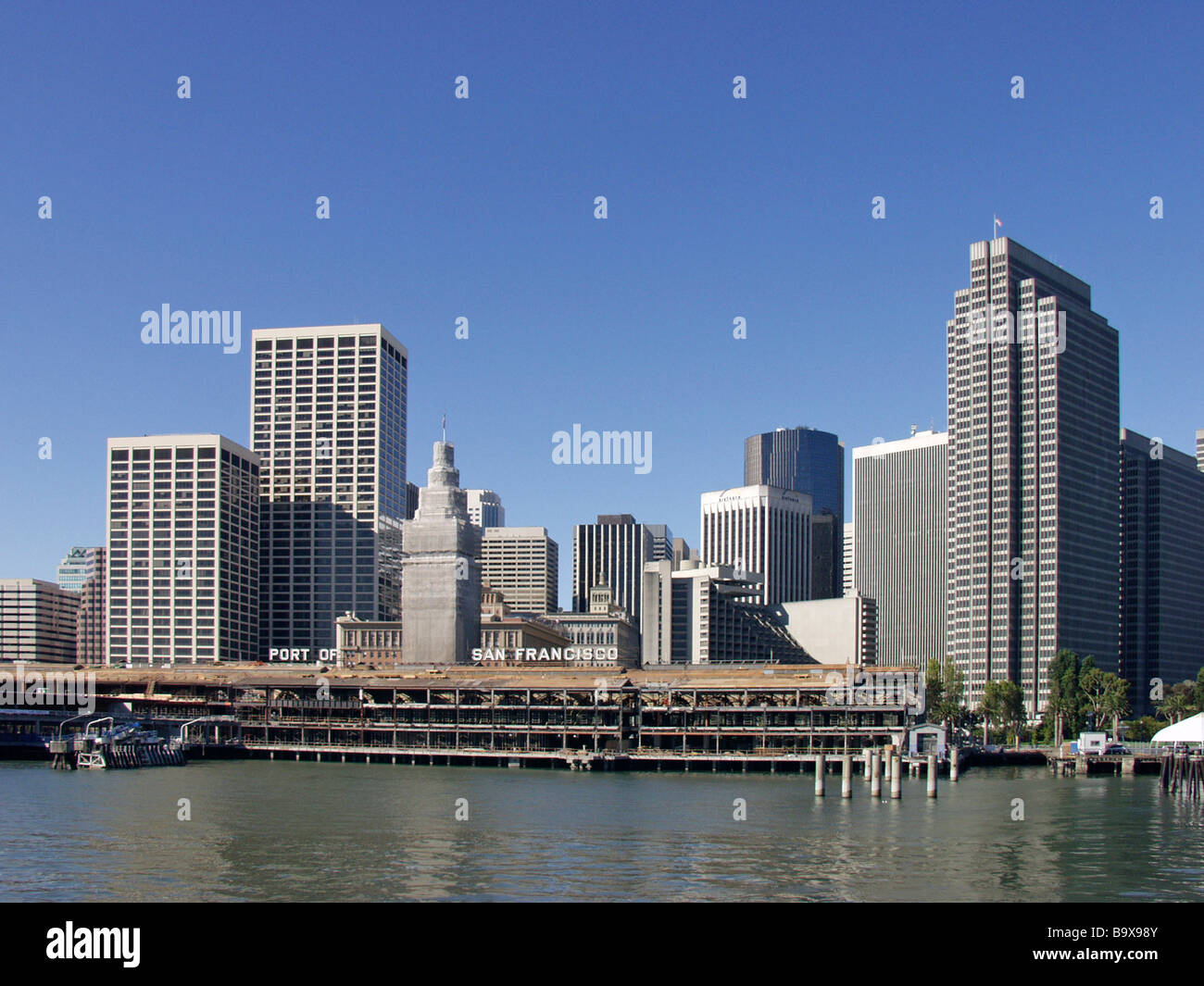 San Francisco ferry building and skyline of financial district in ...