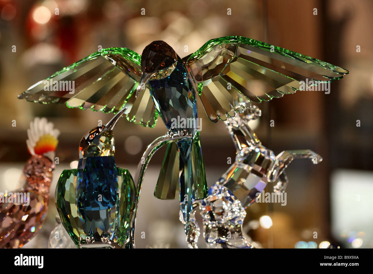 A Crystal bird sculpture of a bird in flight Stock Photo - Alamy