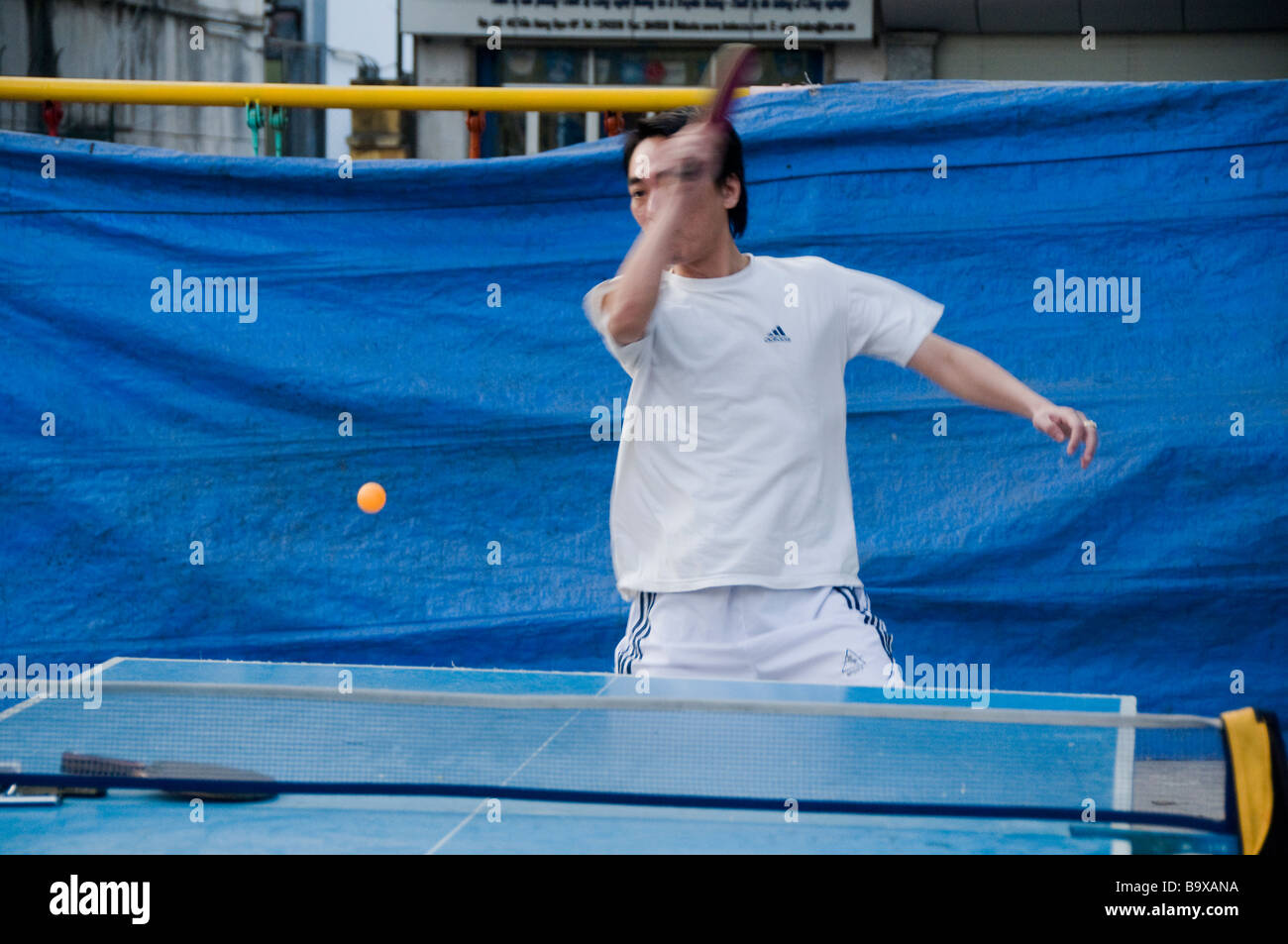 ping pong player in action in Hanoi Vietnam Stock Photo - Alamy