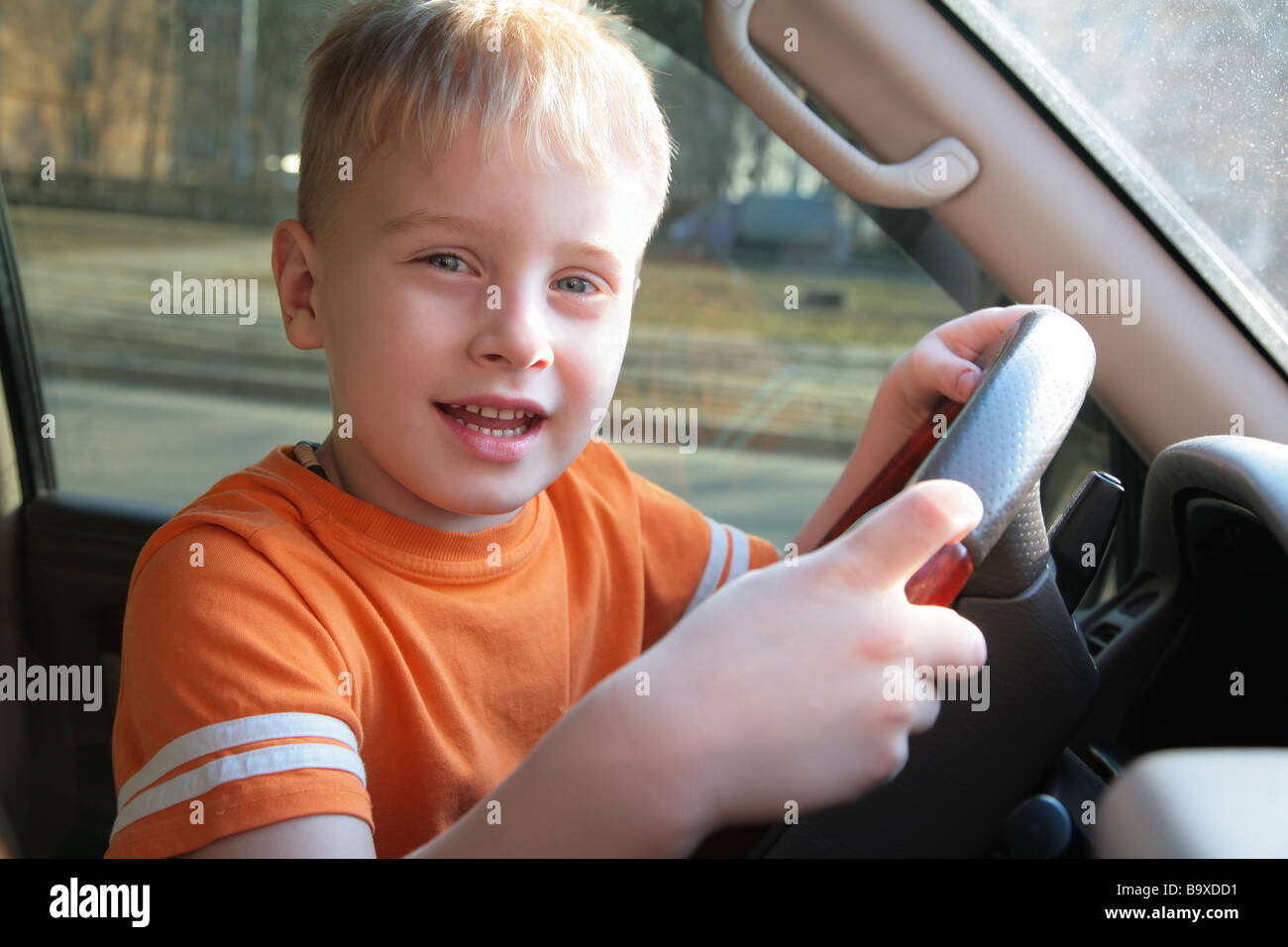 boy in car Stock Photo - Alamy