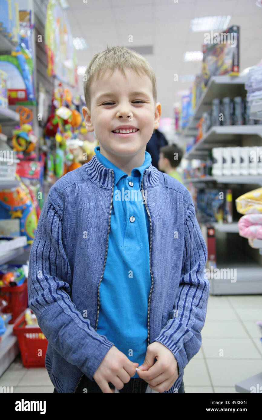 boy in toy section in shop Stock Photo - Alamy