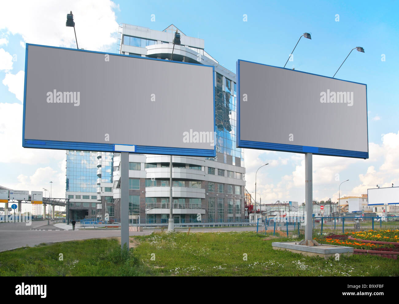 Publicity boards in city Stock Photo - Alamy