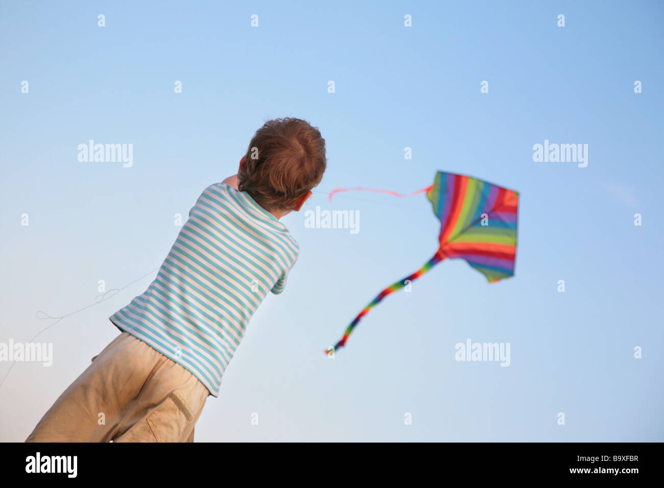 Child starting kite Stock Photo - Alamy