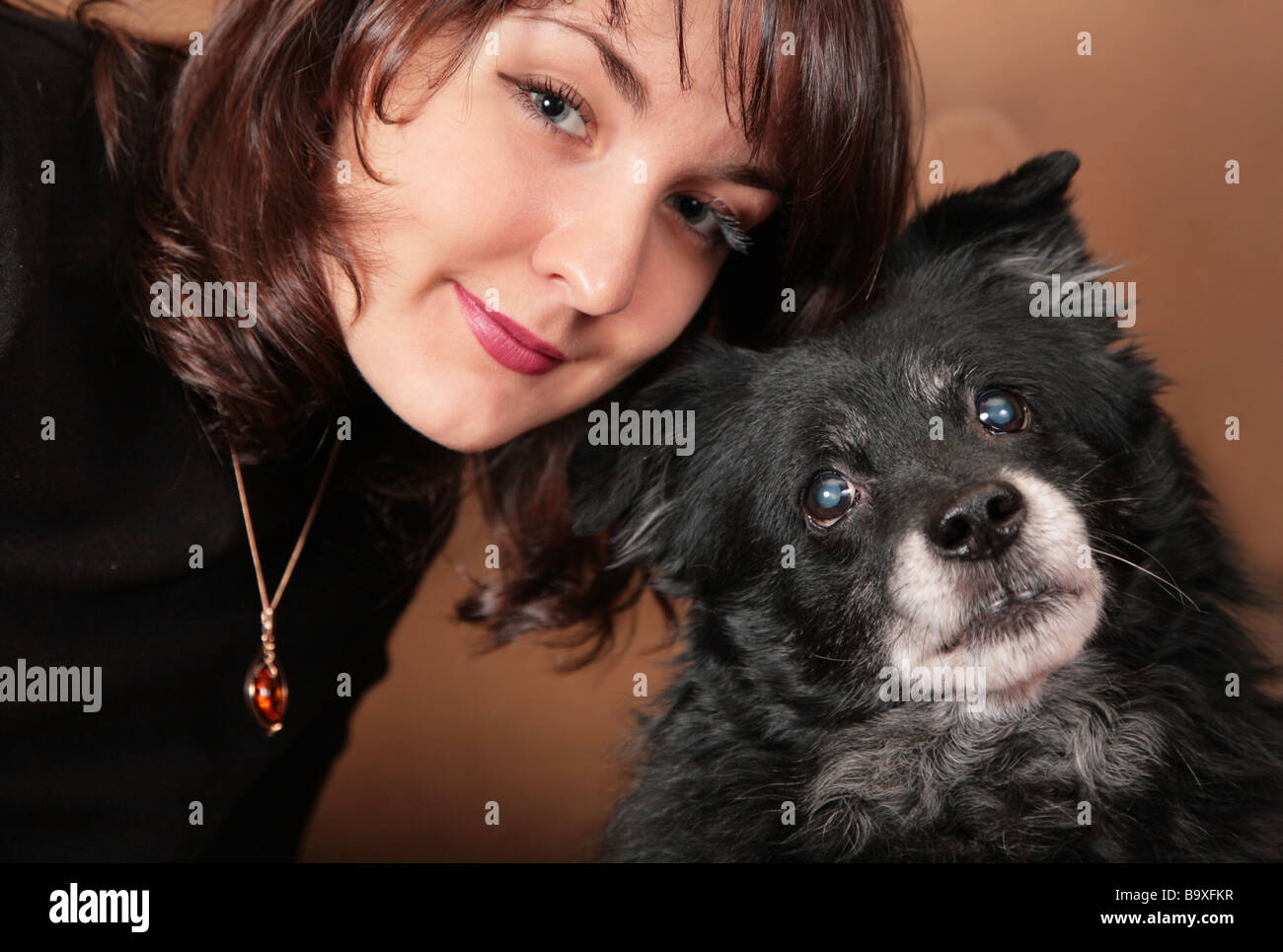 woman brunette with dog Stock Photo - Alamy