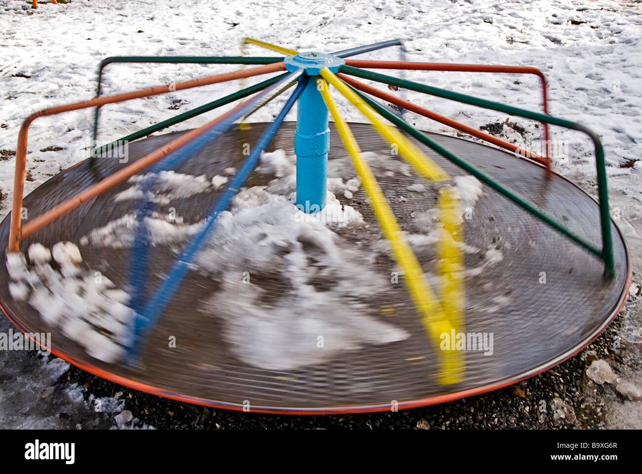 Colourful play wheel full of snow spinning. Brasov, Rumania, Europe ...