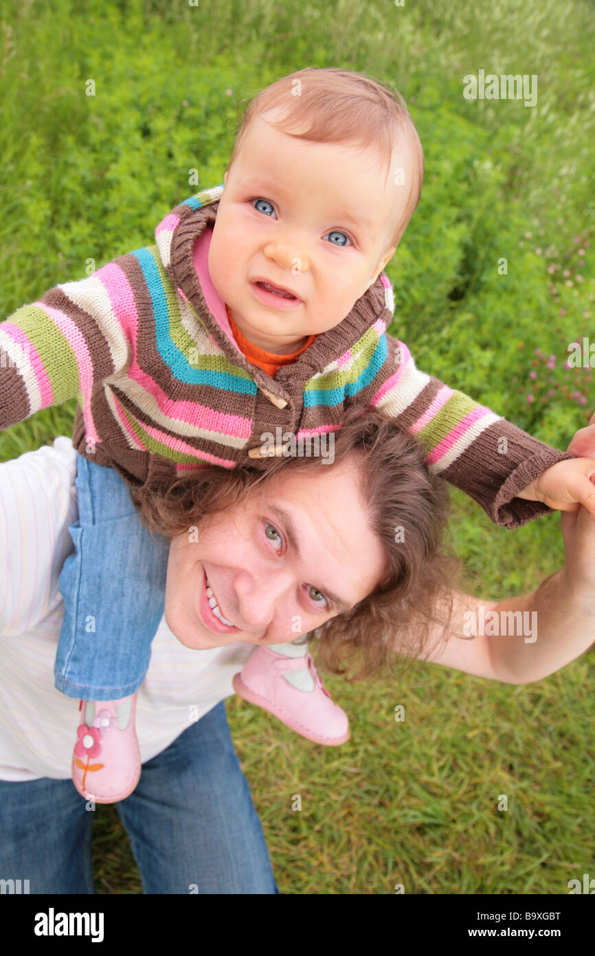 baby on father`s shoulders Stock Photo - Alamy