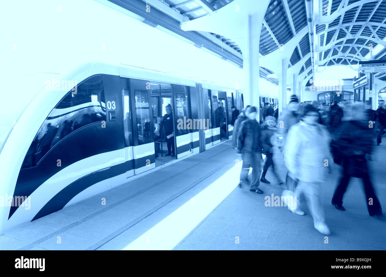 Woman on monorail station hi-res stock photography and images - Alamy