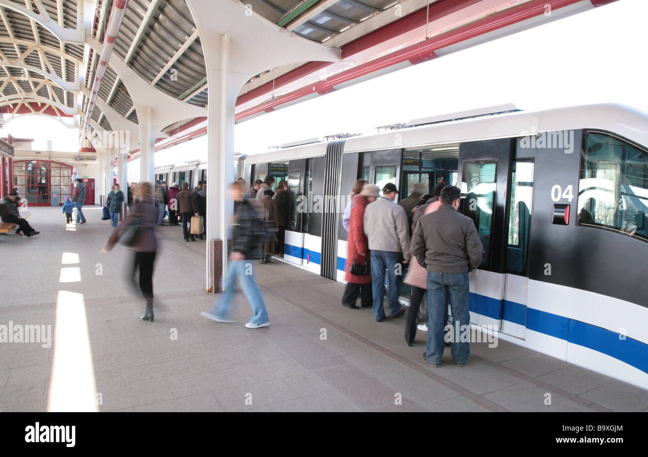 Woman on monorail station hi-res stock photography and images - Alamy