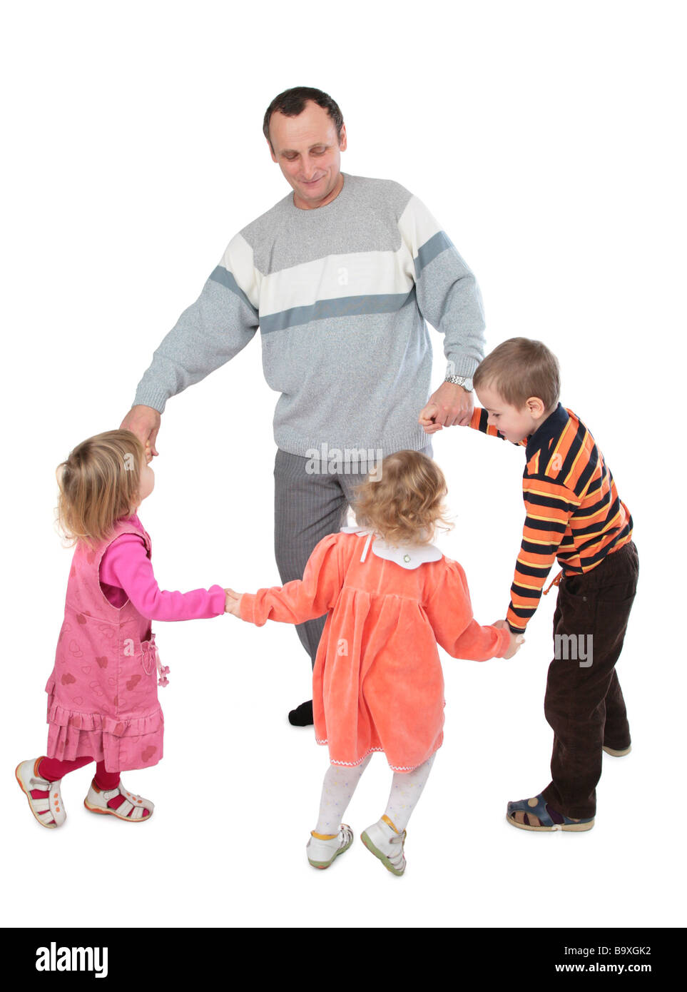 Man with three kids dancing Stock Photo - Alamy