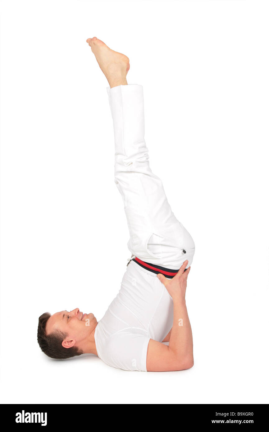 man does gymnastics, standing head over heels Stock Photo - Alamy