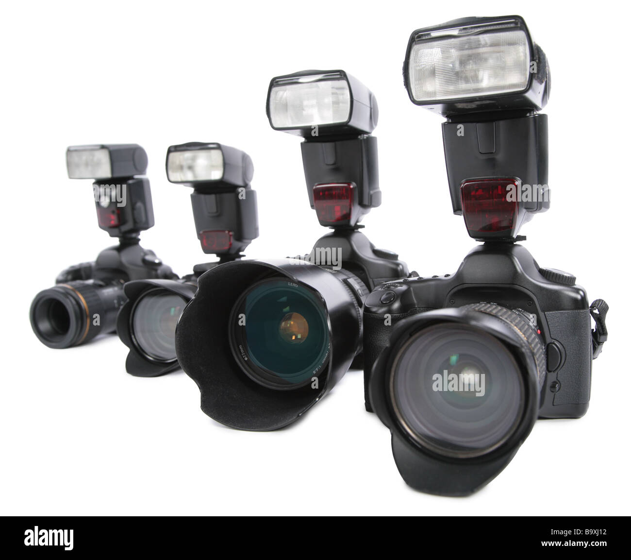 Cameras with flashes on white background in a row Stock Photo - Alamy