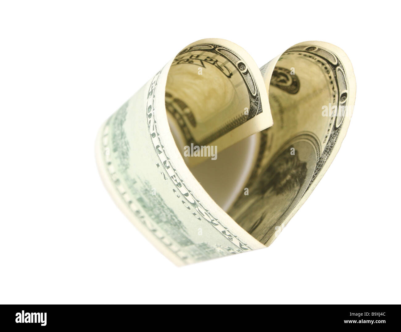 Dollar in form of heart Stock Photo - Alamy