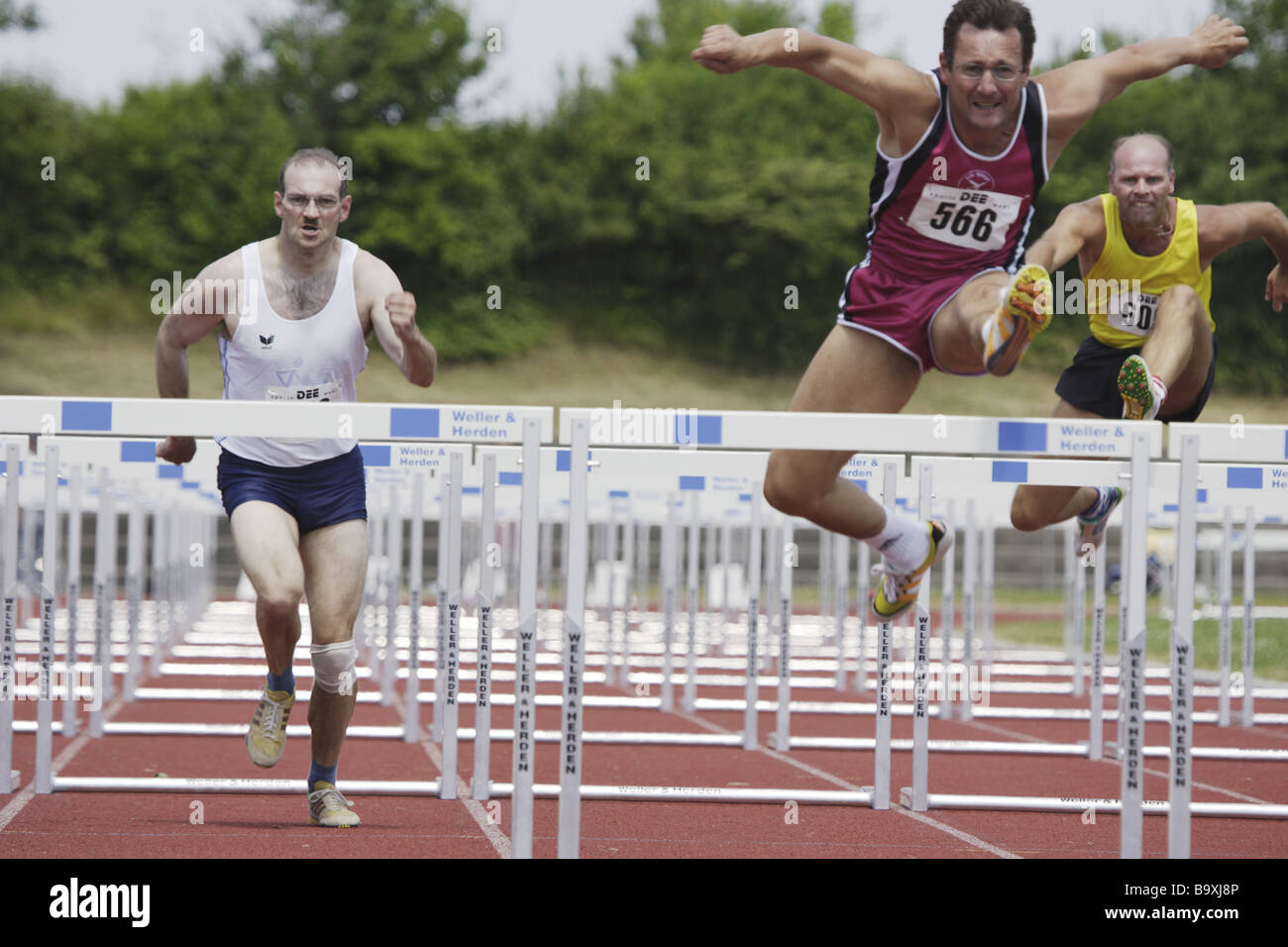 Hurdles athlete men hi-res stock photography and images - Alamy