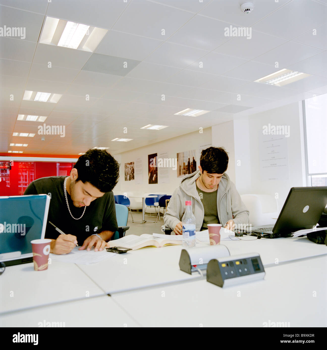 young boy, male working on computer, studying, revising for exams ...