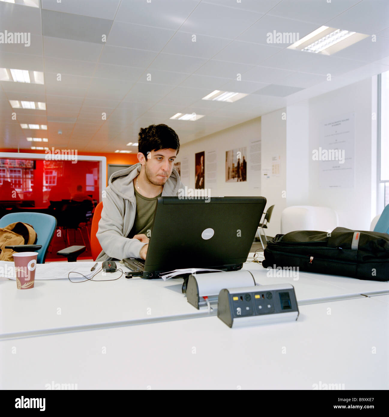 young boy, male working on computer, studying, revising for exams ...