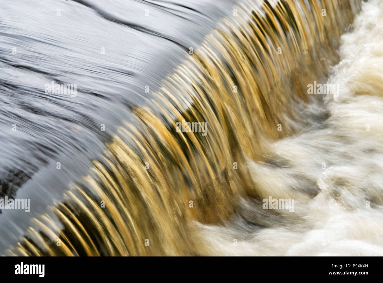 Small man-made waterfall in river, Yorkshire, England Stock Photo - Alamy