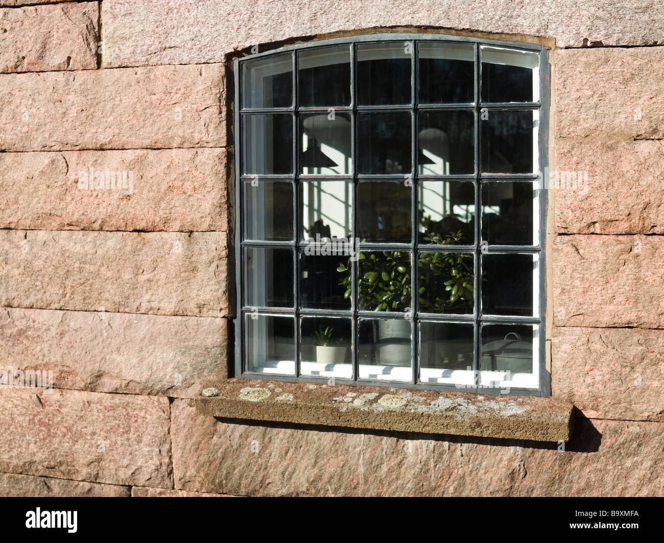 Window in granite facade Stock Photo - Alamy