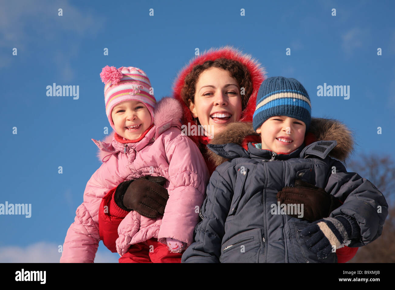 mother and children outdoor in winter Stock Photo - Alamy