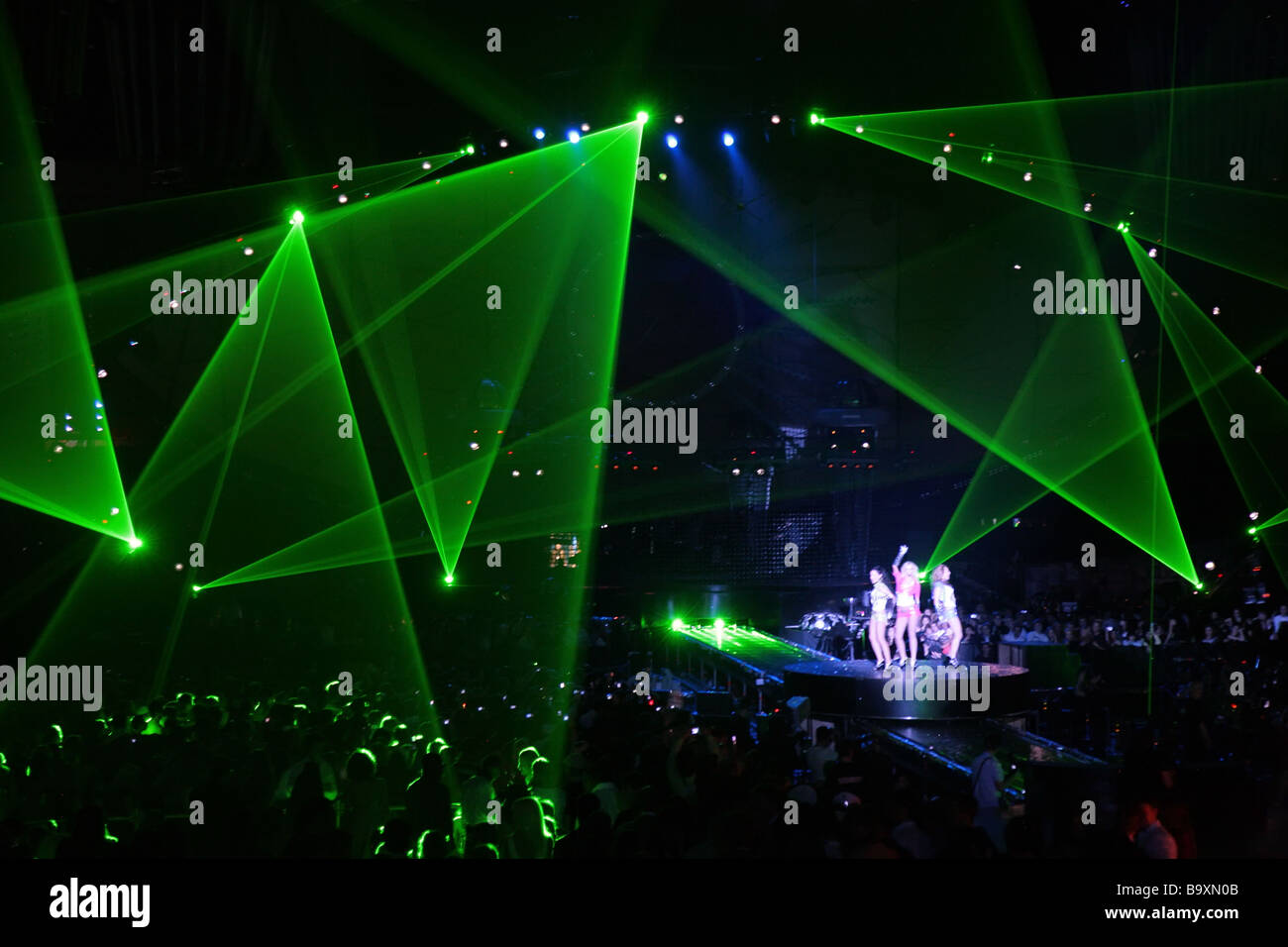 laser beams. actress on scene Stock Photo - Alamy