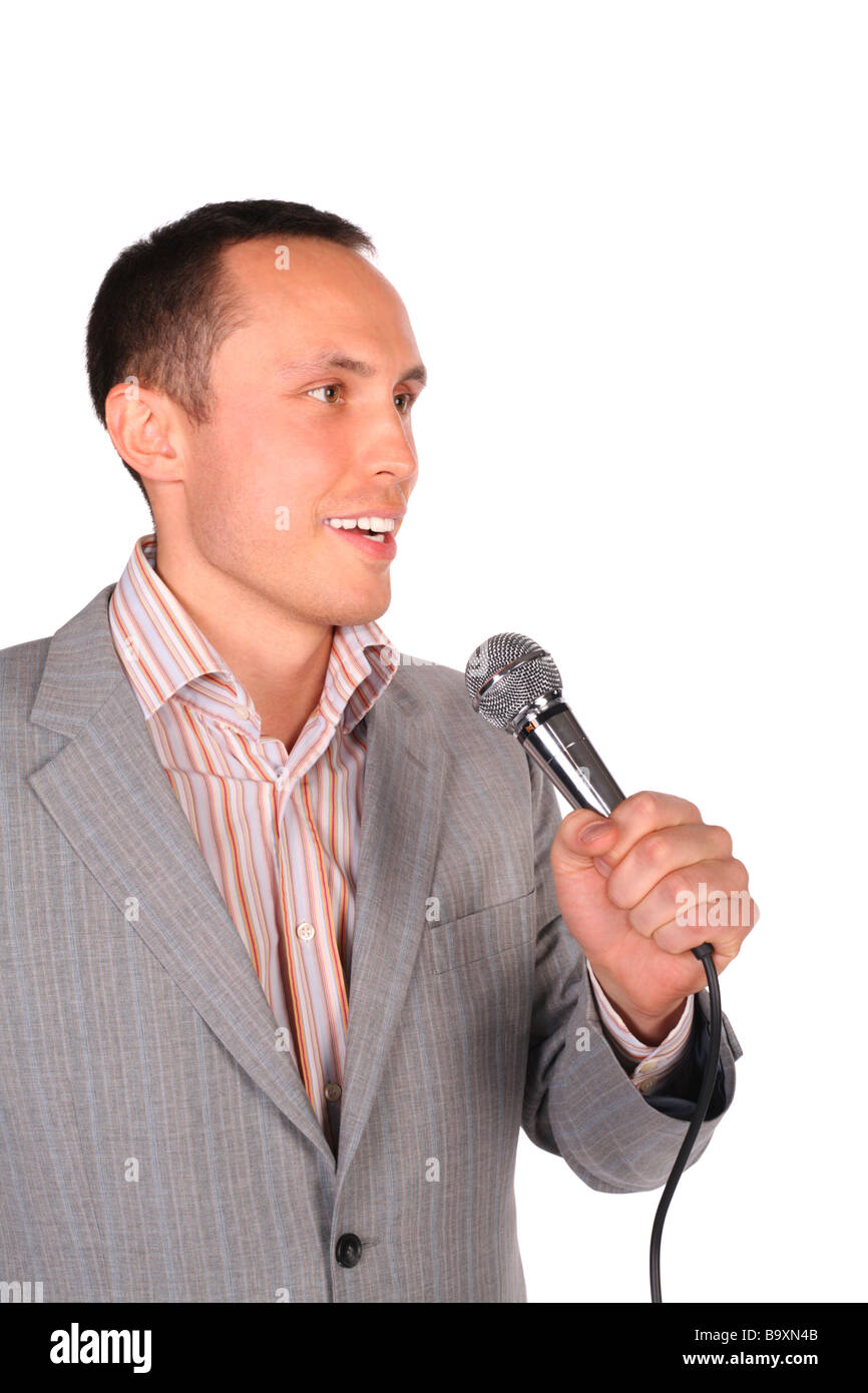 Young man with microphone Stock Photo - Alamy