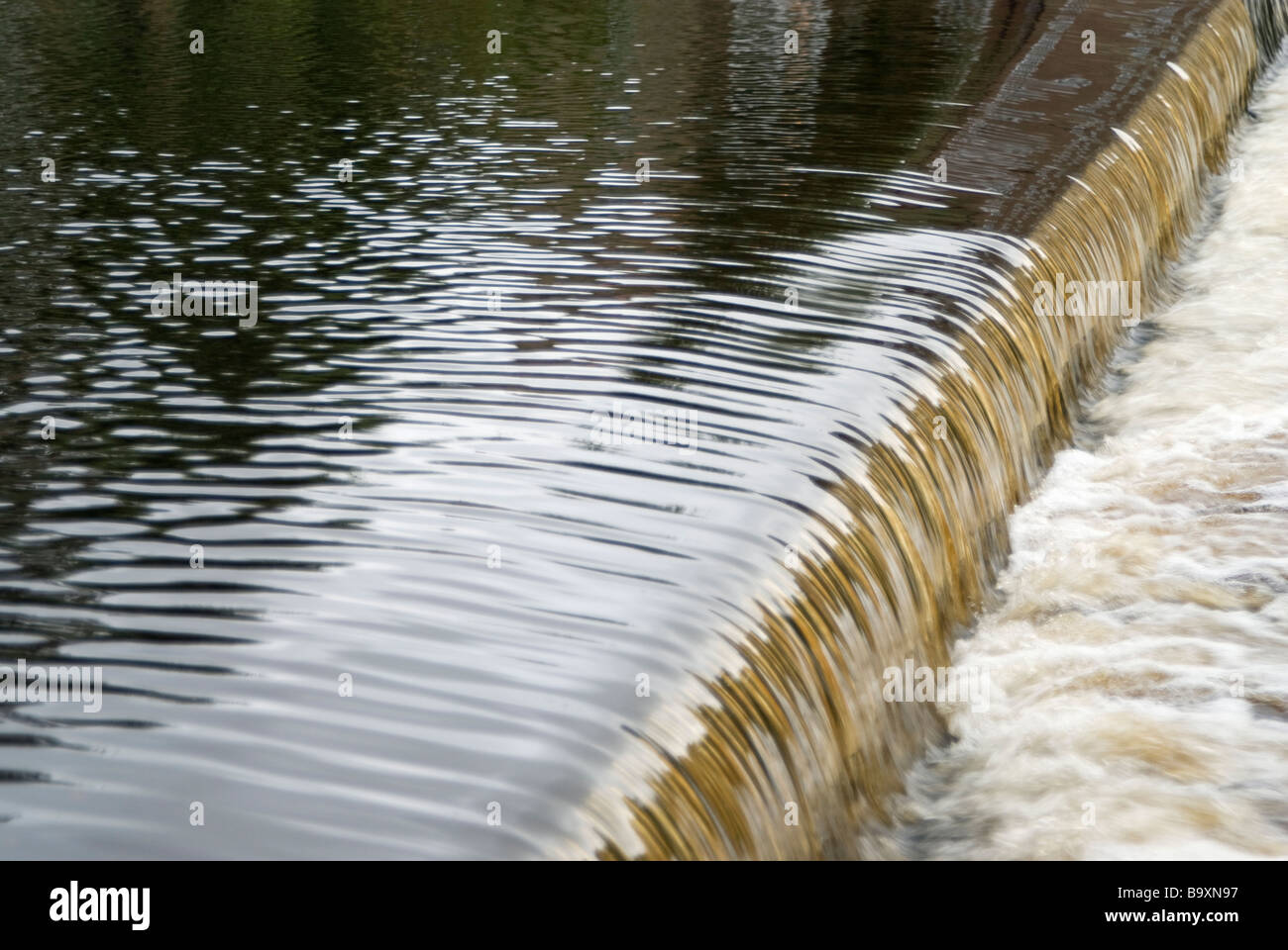 Small man-made waterfall in river, Yorkshire, England Stock Photo - Alamy
