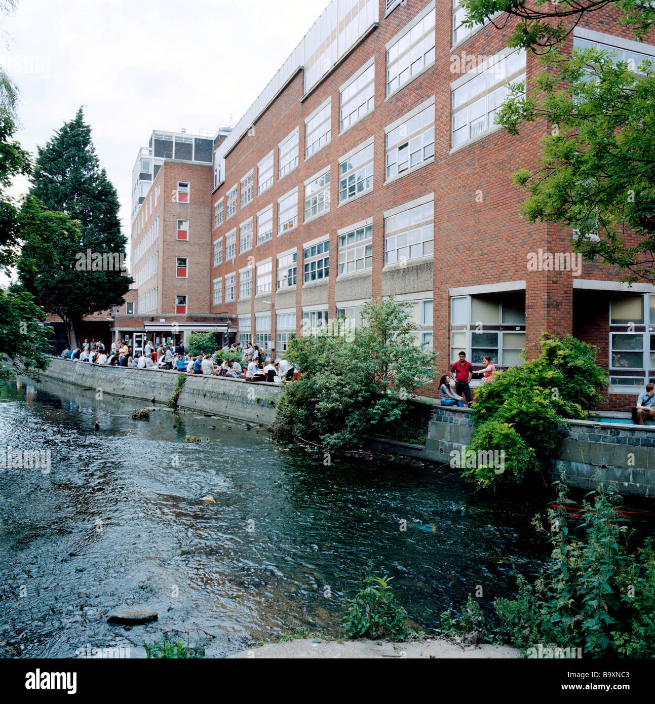 Large university building, an open day with many students and parents ...