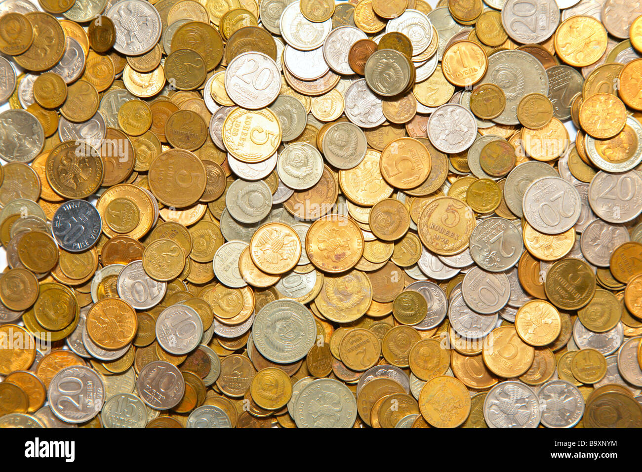 pile of coins Stock Photo - Alamy