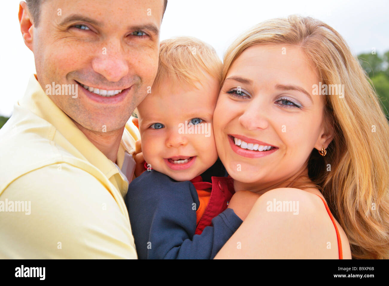 smiling family. faces closeup Stock Photo - Alamy
