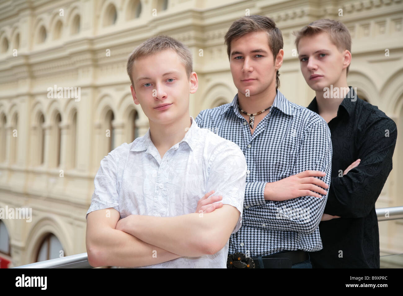 three freinds indoor Stock Photo - Alamy