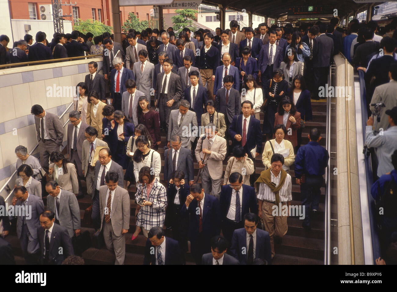 Tokyo crowds passengers hi-res stock photography and images - Alamy