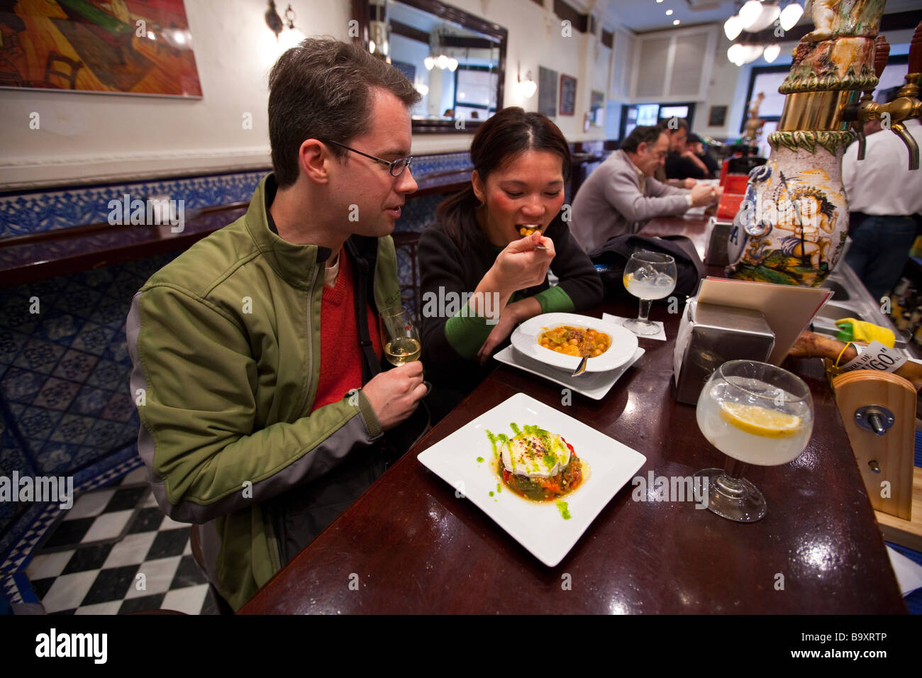 People eating tapas bar in hi-res stock photography and images - Alamy
