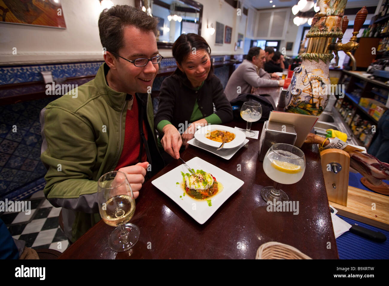 Couple eating tapas seville hi-res stock photography and images - Alamy