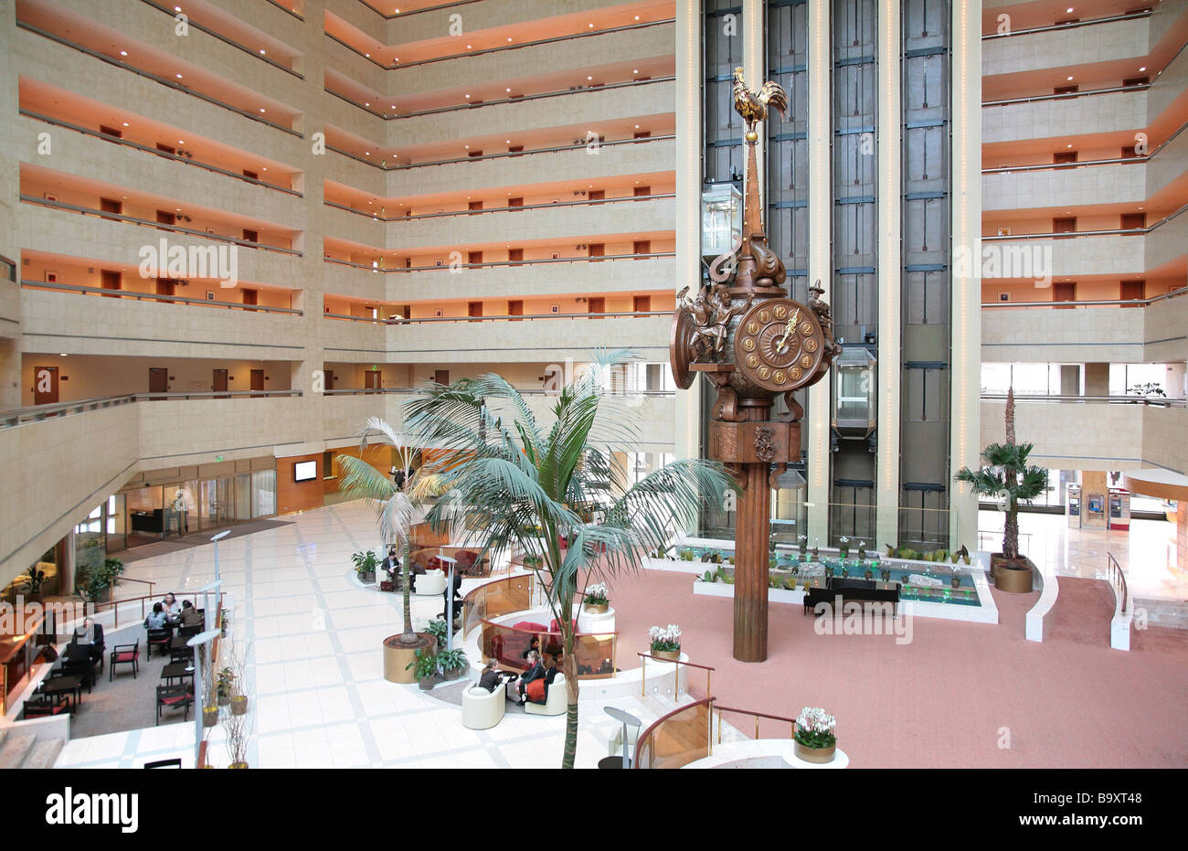 interior of trade center with clock Stock Photo - Alamy