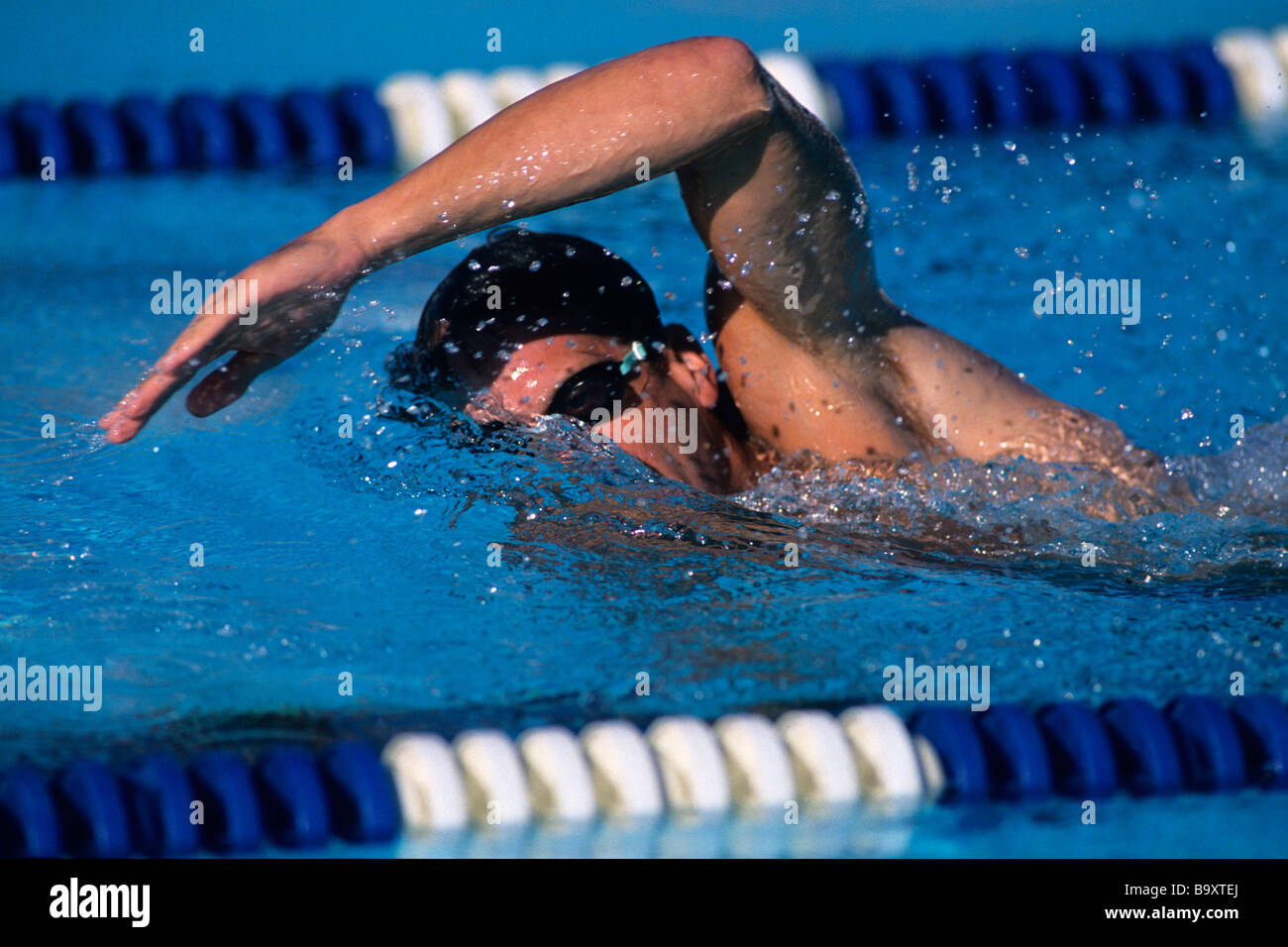 Male swimmer in action Stock Photo - Alamy