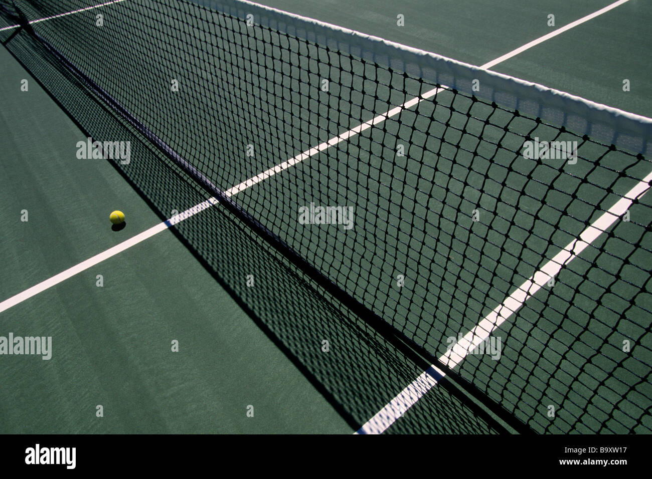 Tennis net and ball Stock Photo - Alamy