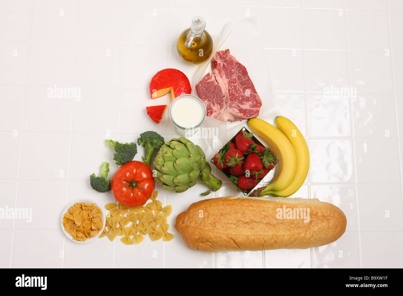 Food Pyramid on white tile Stock Photo - Alamy