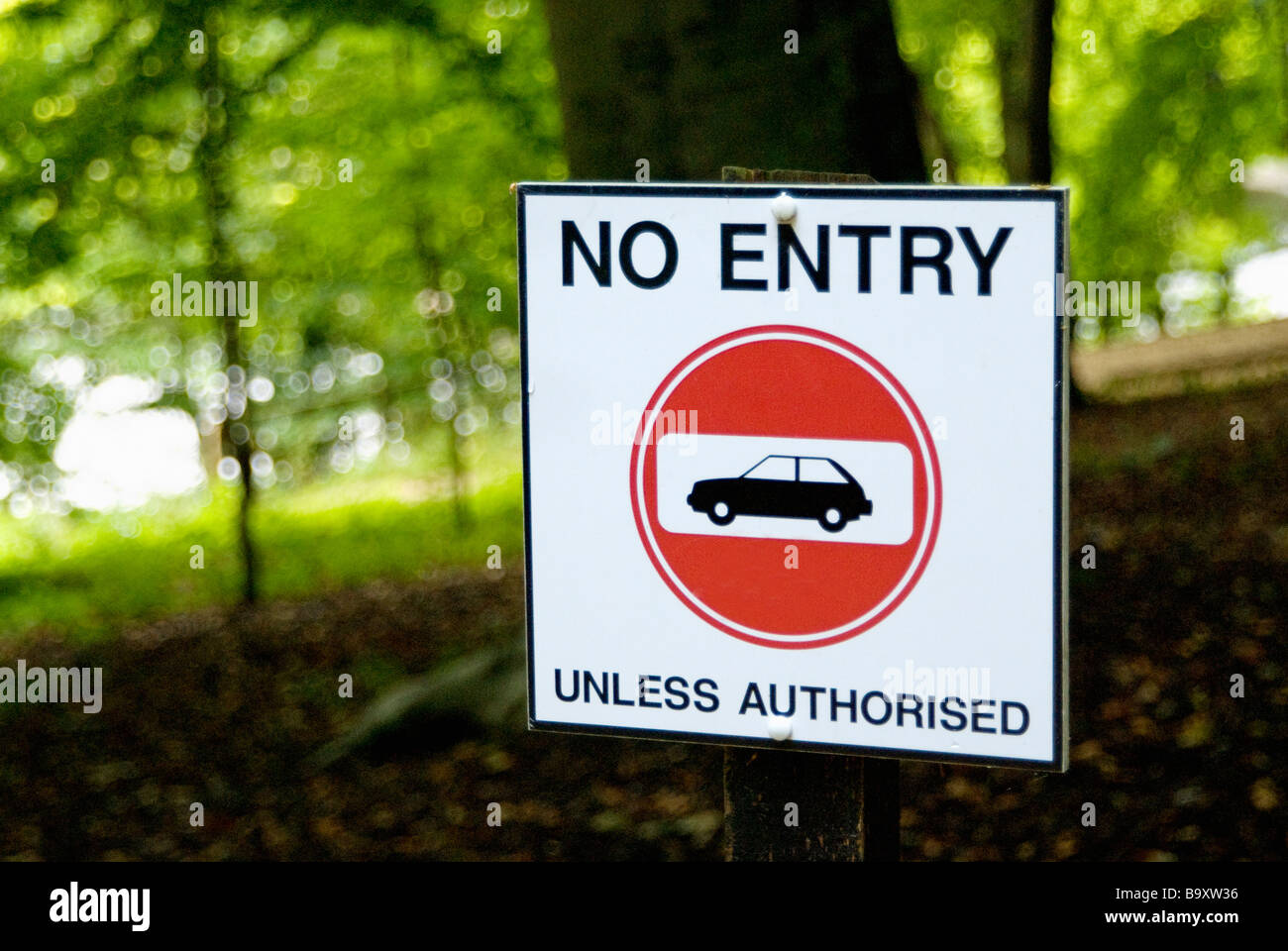'No Entry unless authorised' sign for cars, England Stock Photo - Alamy