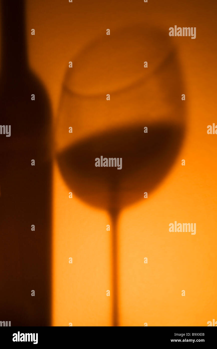 Wine bottle and glass shadow Stock Photo - Alamy