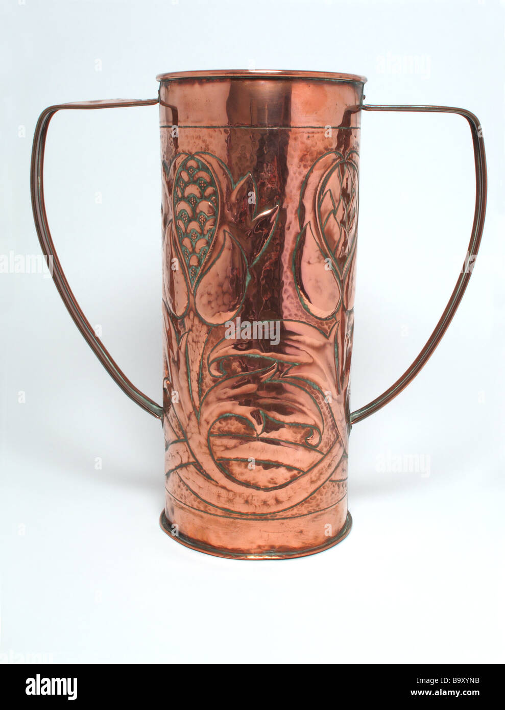 Antique english arts copper repousse hi-res stock photography and ...