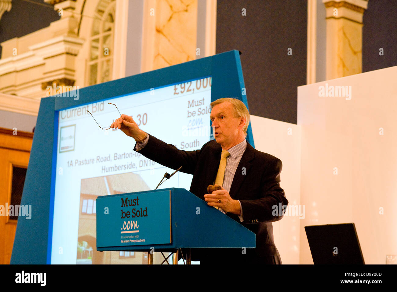 AUCTIONEER GRAHAM PENNY, DURING PROPERTY AUCTION ORGANISED BY ...