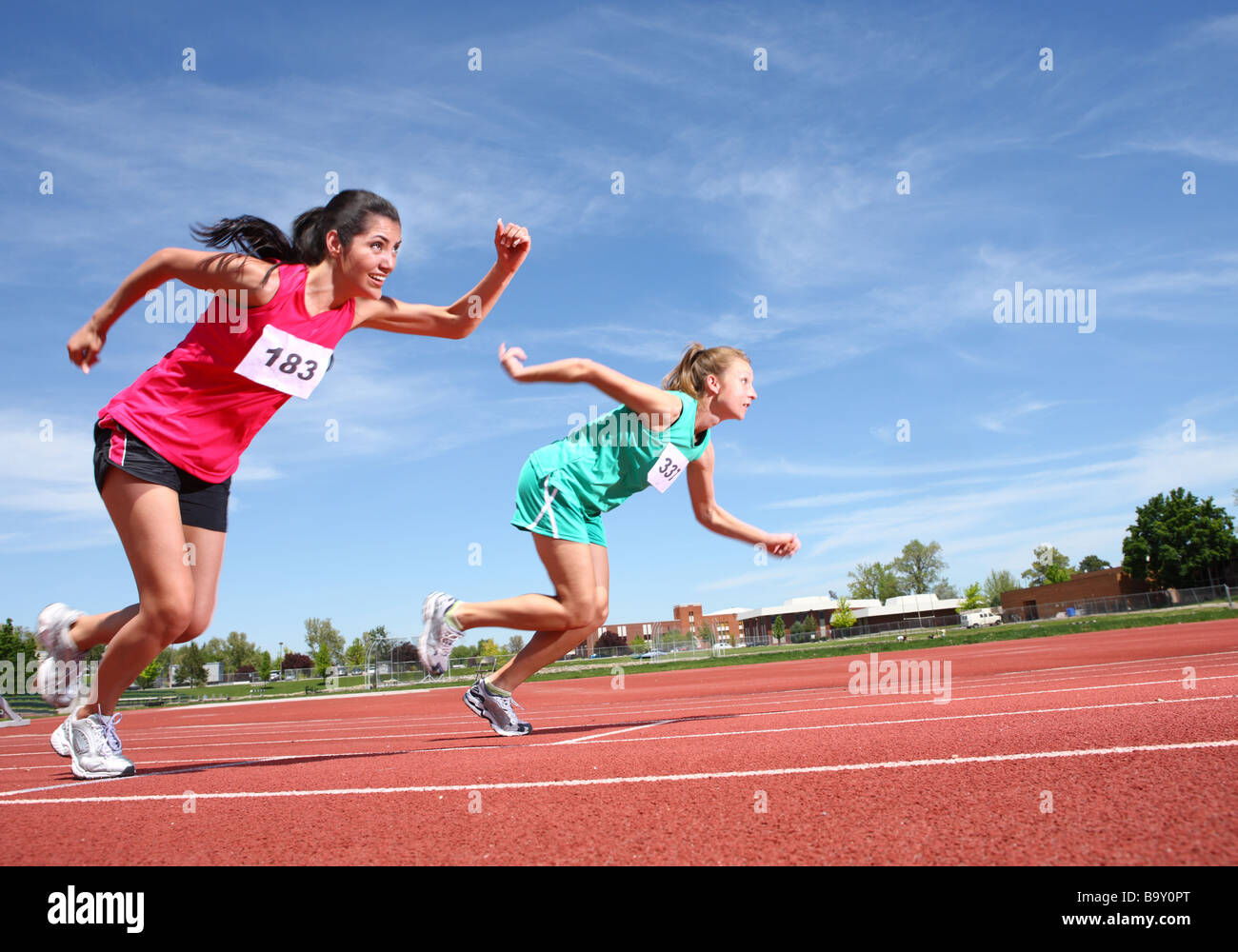 Two women starting running race hi-res stock photography and images - Alamy