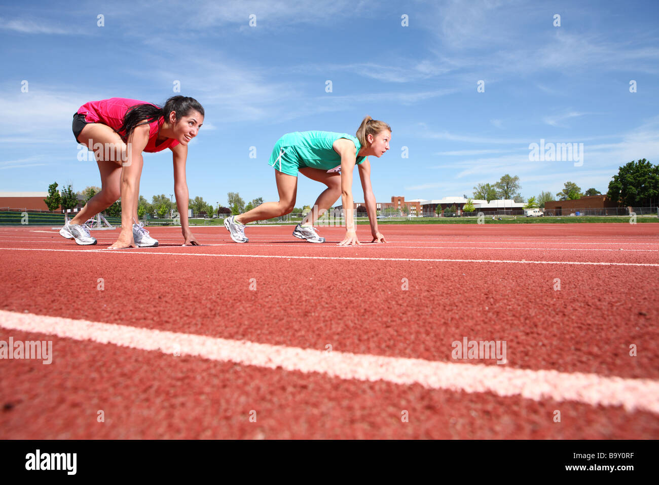 Two female racers at starting line Stock Photo - Alamy