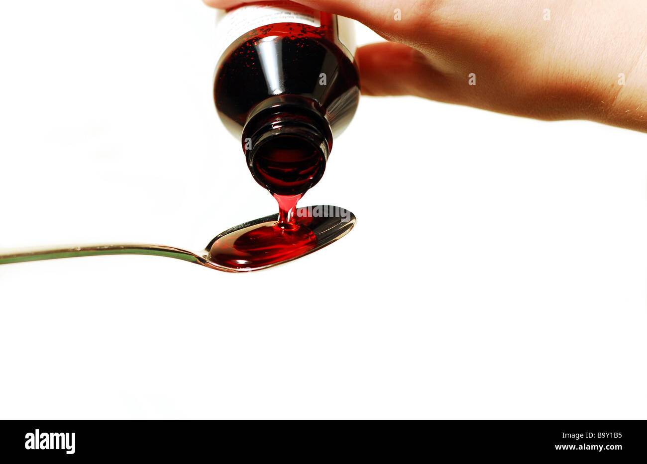 Medicine poured spoon white background hi-res stock photography and ...