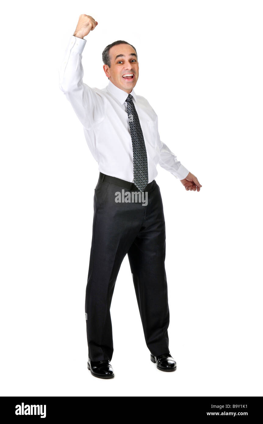 Happy celebrating business man in suit isolated on white background ...