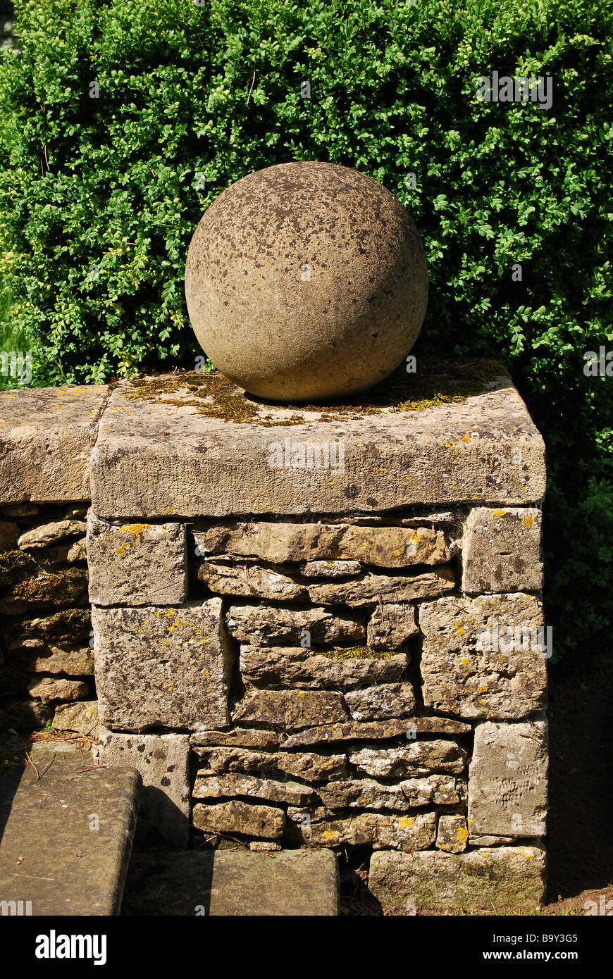 Stone Wall Pillar and sphere Stock Photo - Alamy